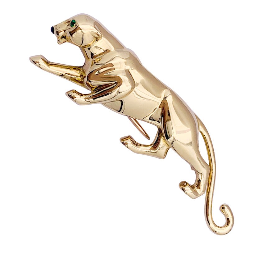 Brooch Cartier, "Samantha", yellow goldemerald and onyx.